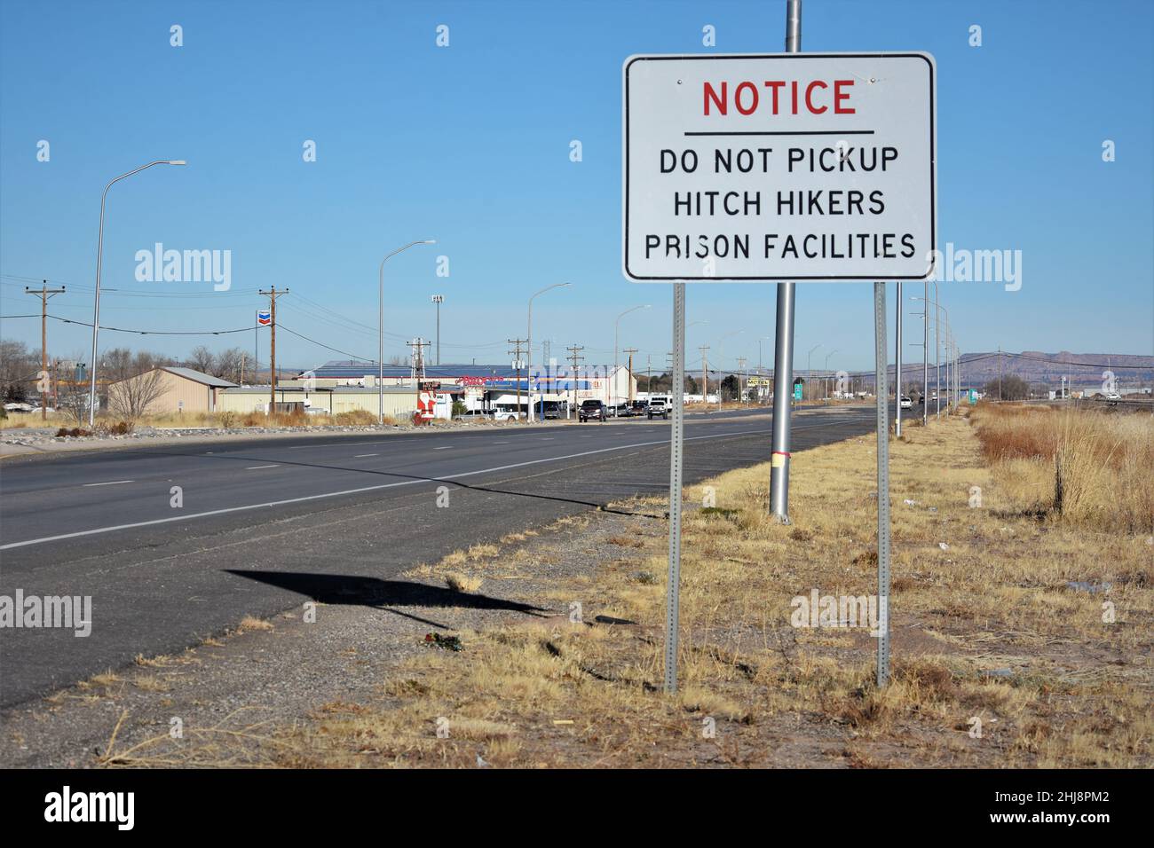 warning sign on route 66 about not giving a ride or life to hitch ...