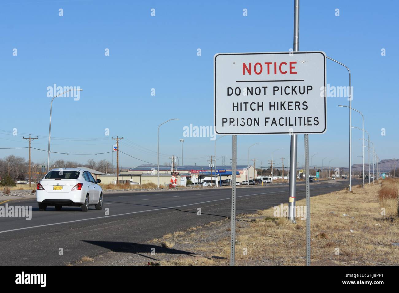 warning sign on route 66 about not giving a ride or life to hitch ...