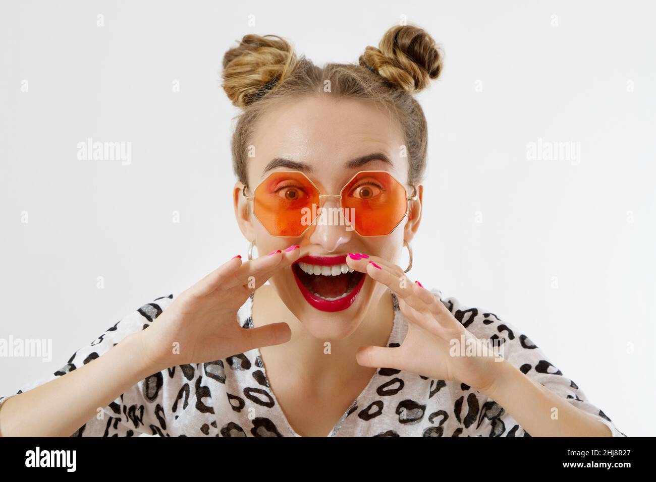 Shouting woman face. Fashion female closeup in trendy clothes isolated ...