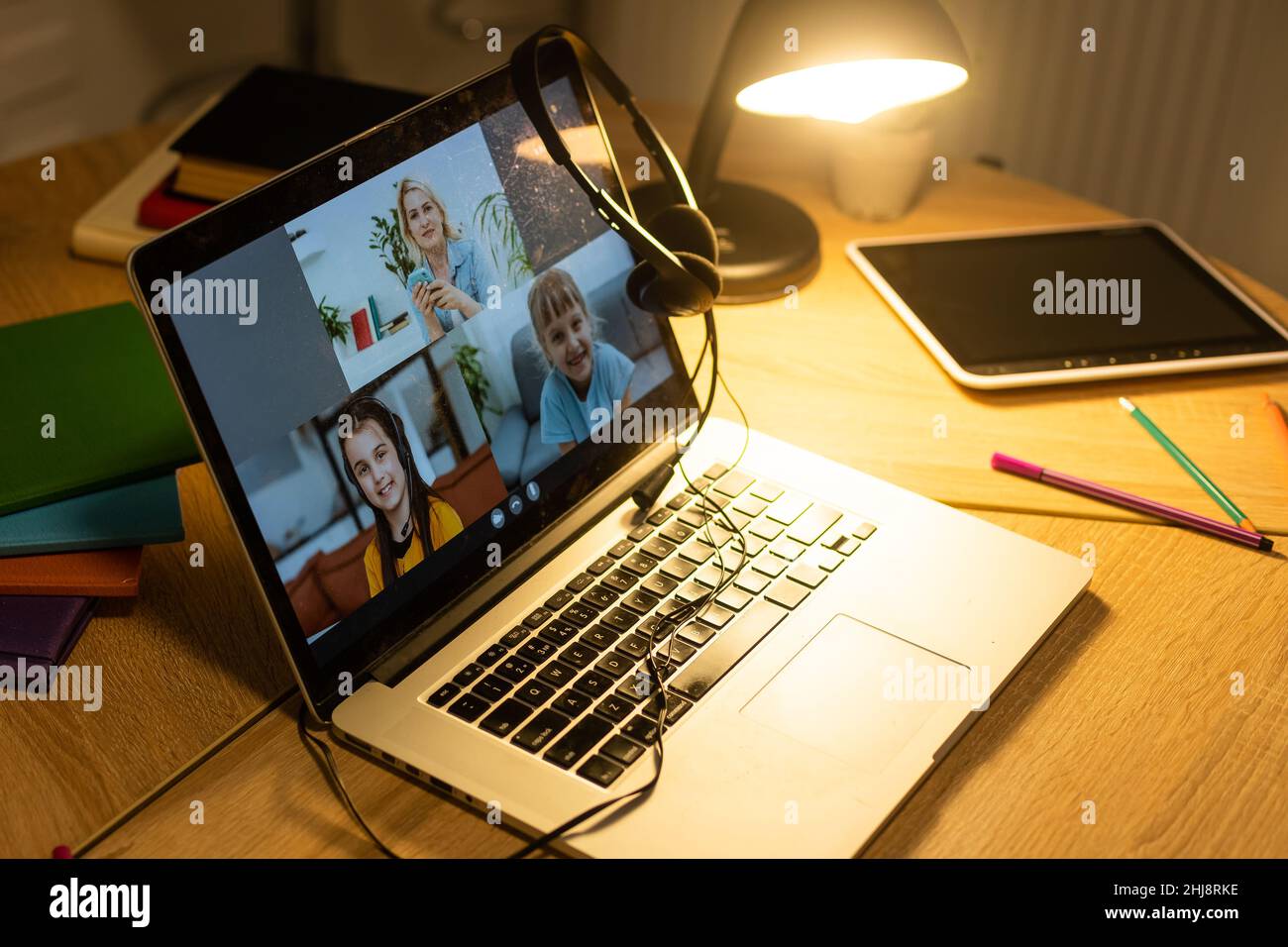 Online education of children. Girl schoolgirl teaches a lesson online ...