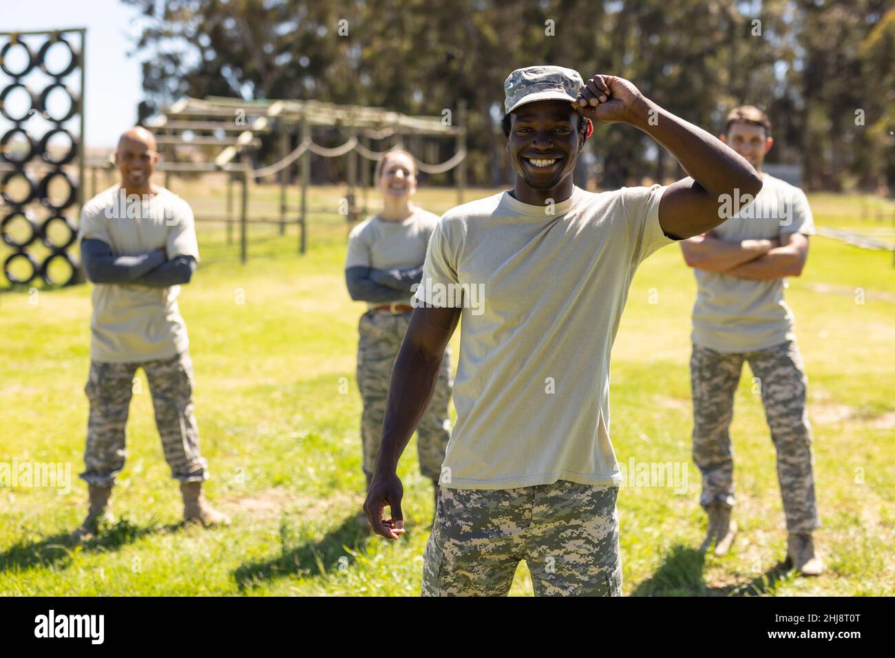Portrait of male african american soldier smiling standing at boot camp ...