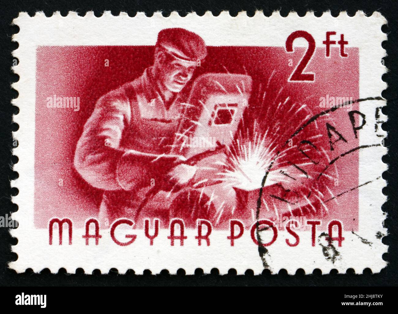 HUNGARY - CIRCA 1955: a stamp printed in the Hungary shows Welder ...