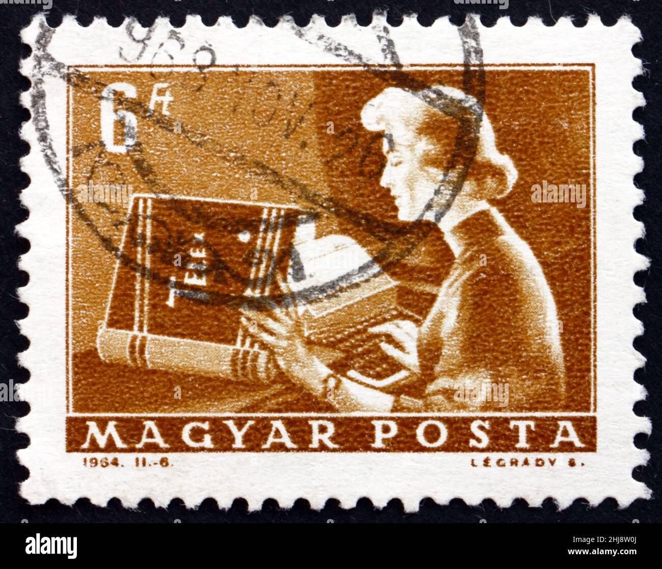 HUNGARY - CIRCA 1964: a stamp printed in the Hungary shows Woman ...