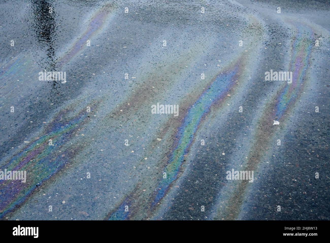Oil stain on Asphalt, color Gasoline fuel spots on Asphalt Road as ...