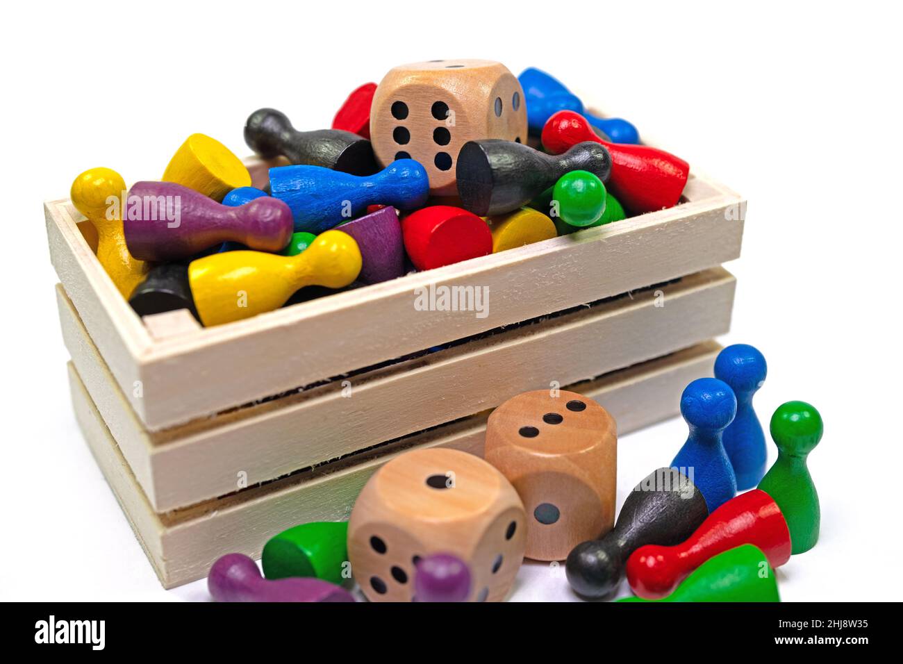 Lots of colorful game pieces and dice for board games Stock Photo - Alamy