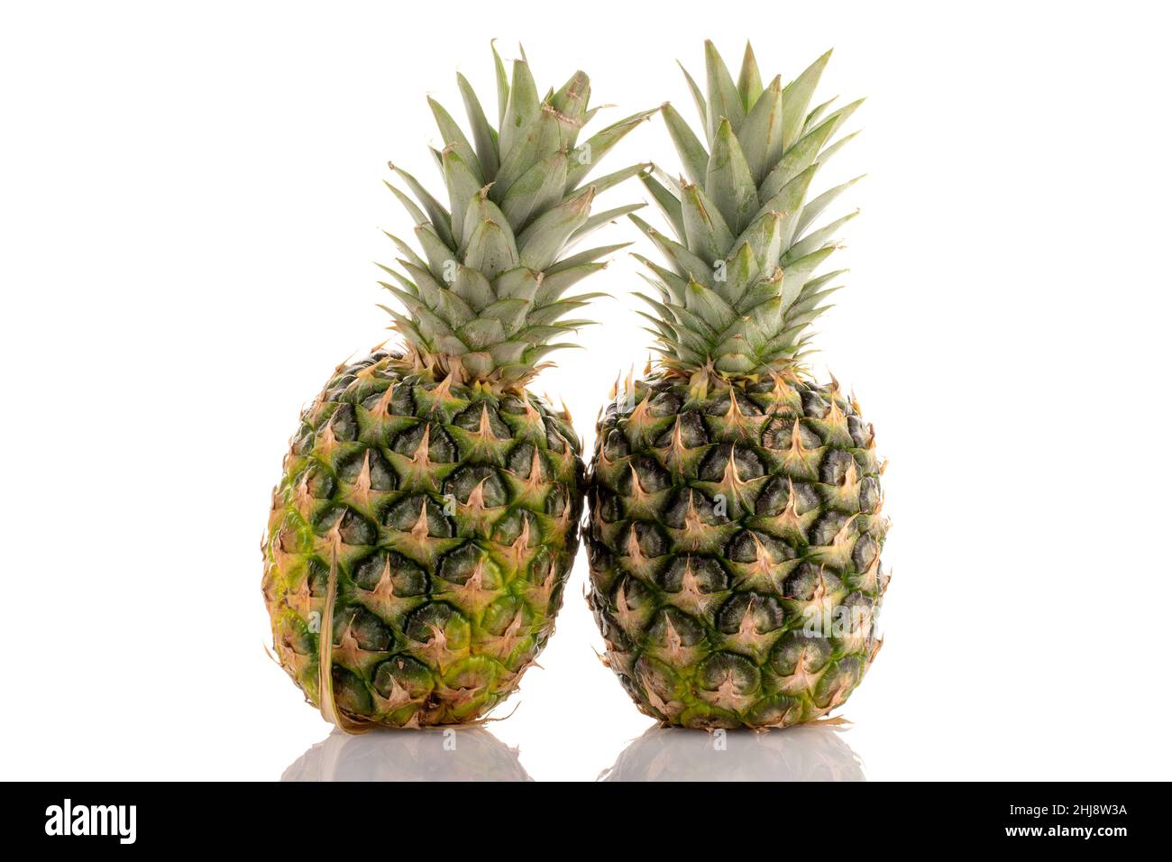 Two ripe organic pineapples, close-up, isolated on white Stock Photo - Alamy