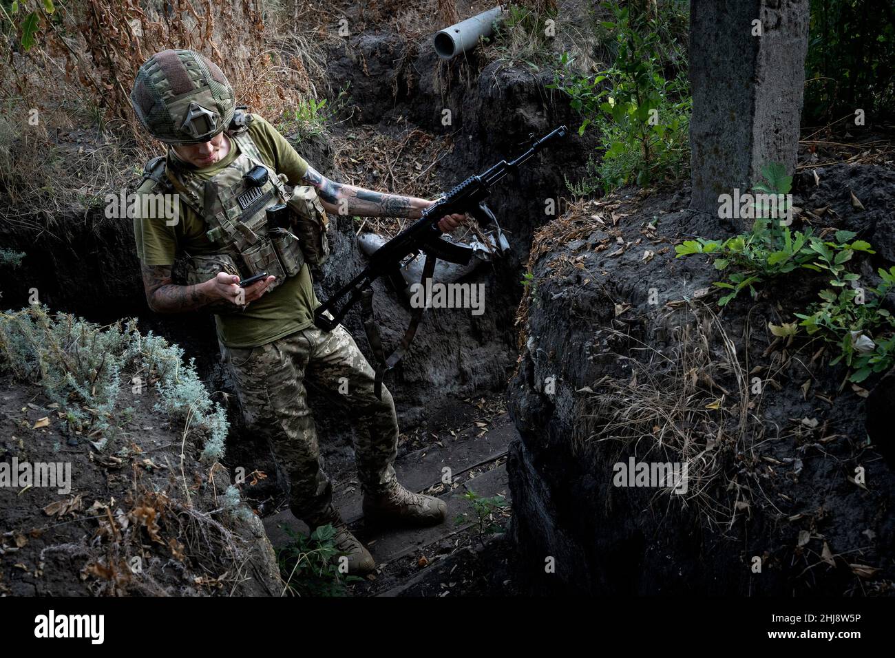 Marinka, Ukraine. 24th July, 2021. A soldier of the Armed Forces of ...