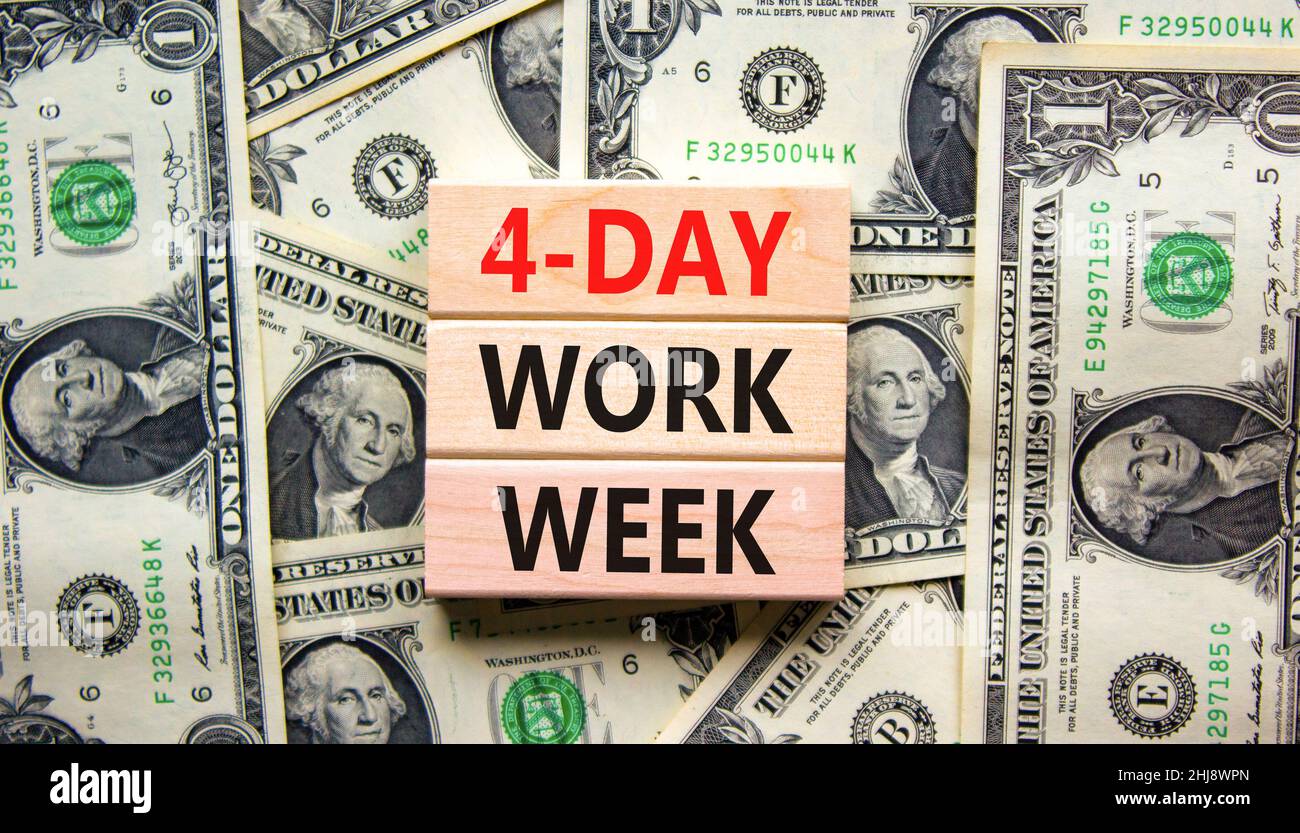 4-day work week symbol. Concept words 4-day work week on wooden blocks ...