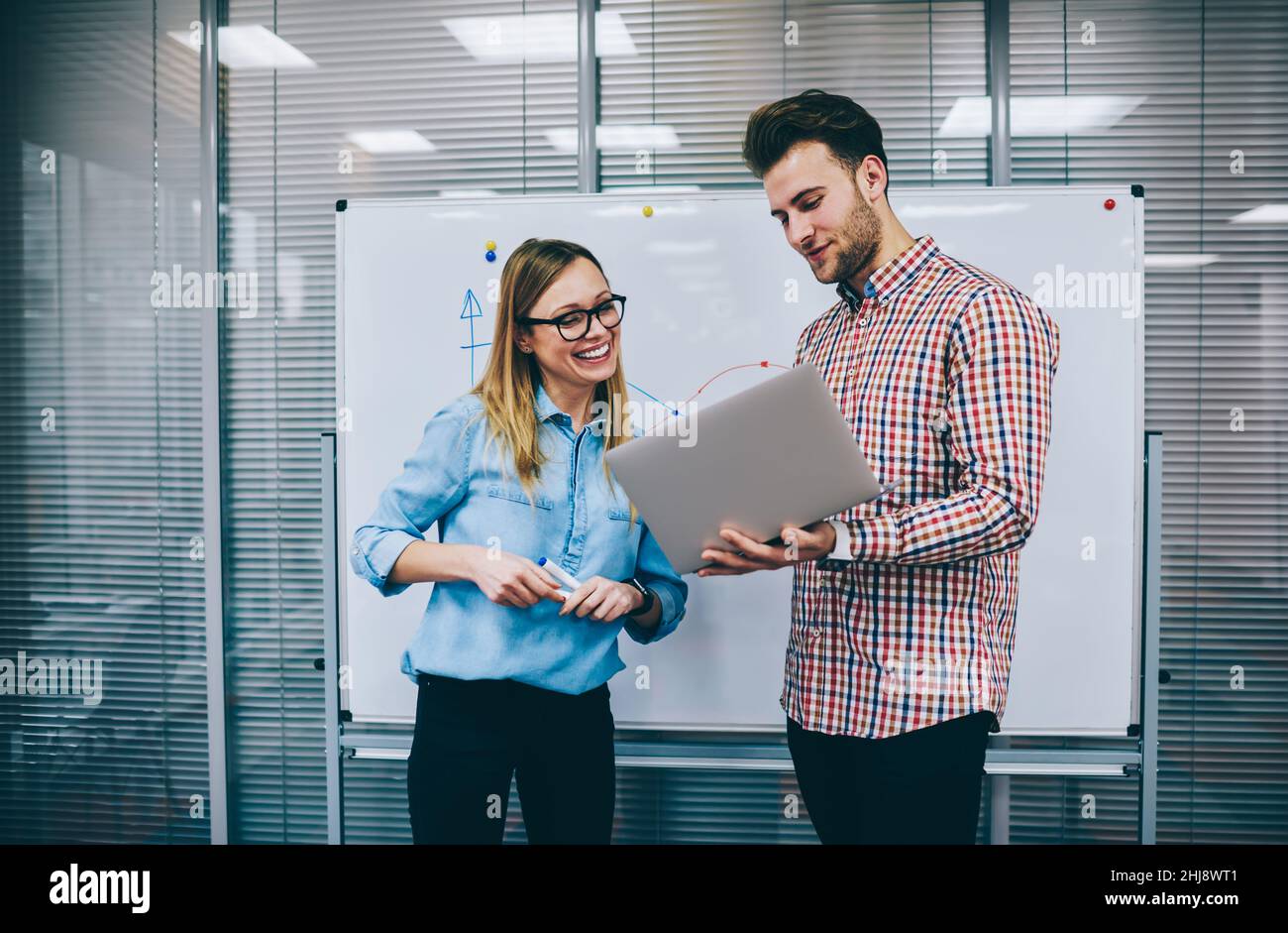 Corporate colleague laptop chart hi-res stock photography and images ...