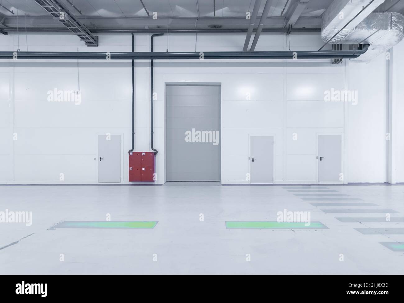 Loading gates of a large industrial warehouse. Industrial interior ...