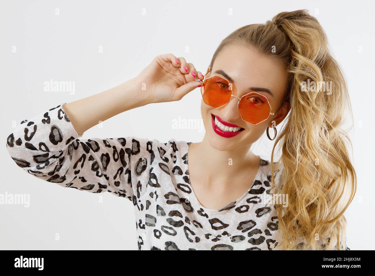 Close-up woman face. Fashion female closeup in trendy clothes isolated ...