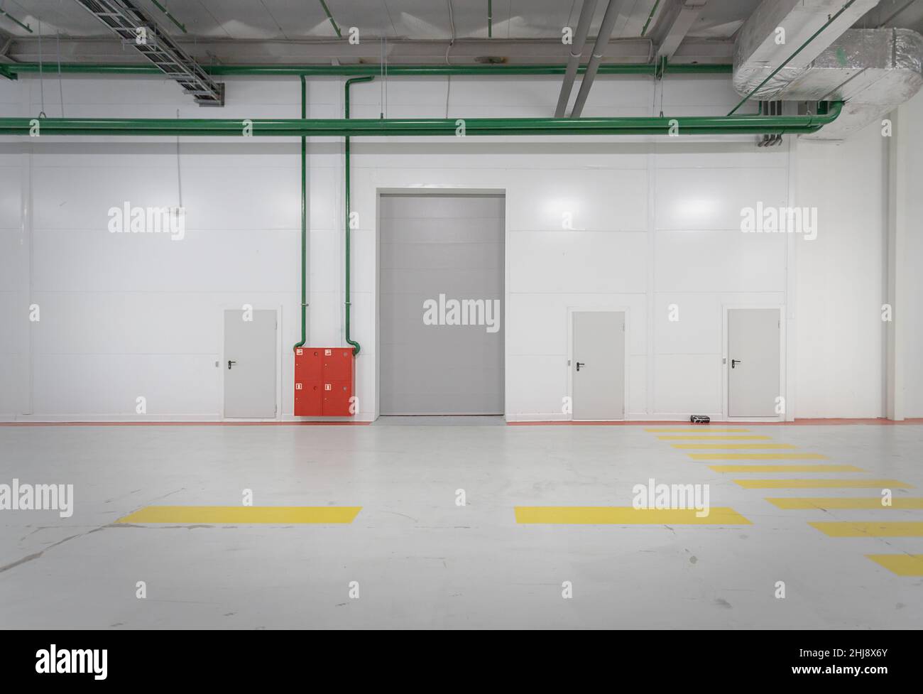 Loading gates of a large industrial warehouse. Industrial interior ...