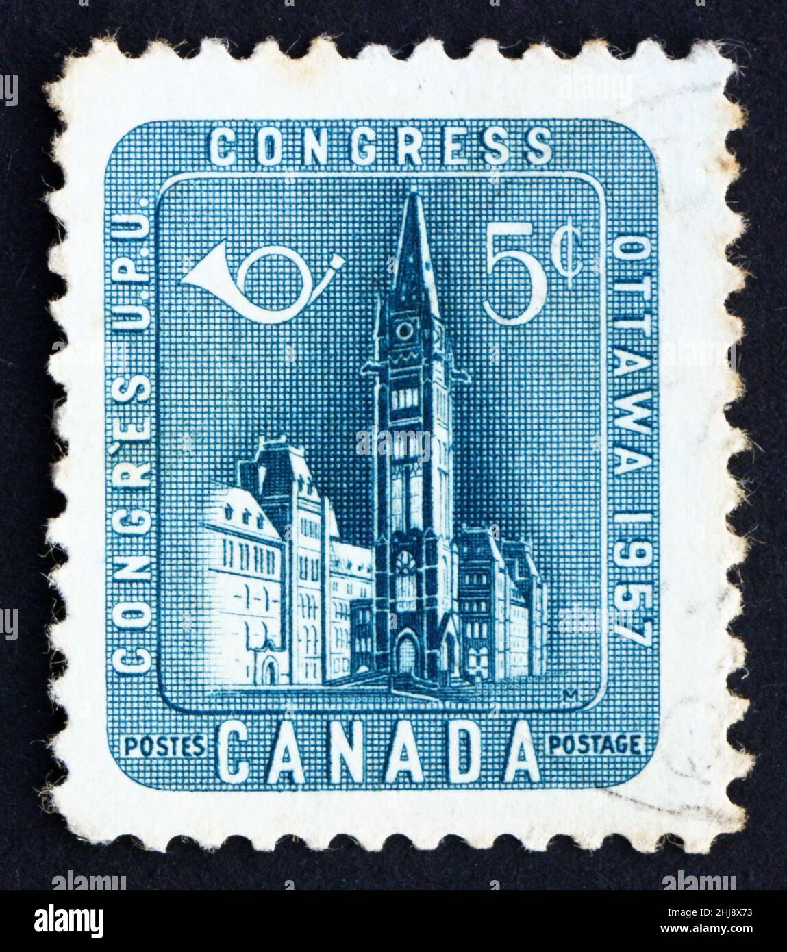 CANADA - CIRCA 1957: a stamp printed in the Canada shows Parliament ...