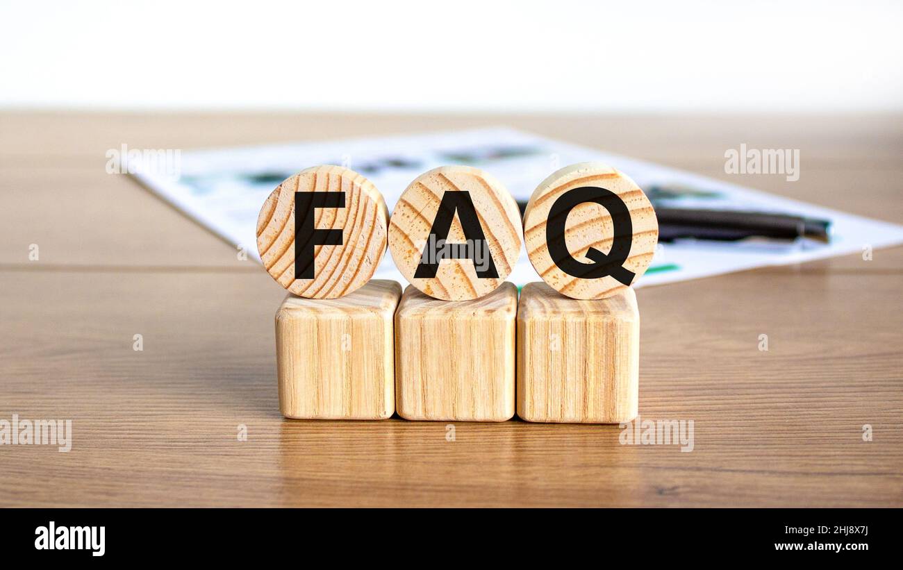FAQ frequently asked questions symbol. Concept words FAQ frequently asked questions on wooden ...