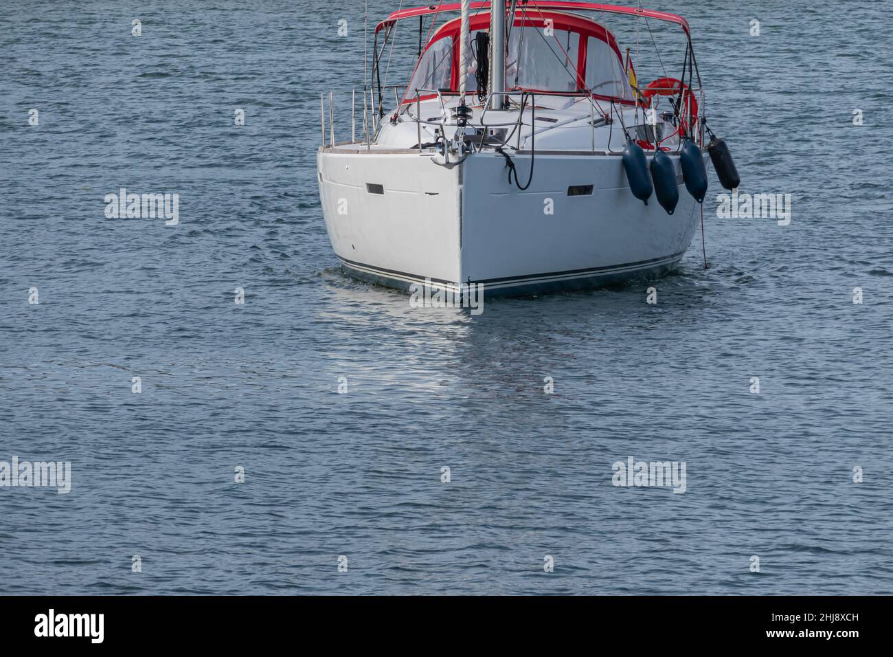 sailing boat in the sea seen from the front in daylight Stock Photo - Alamy