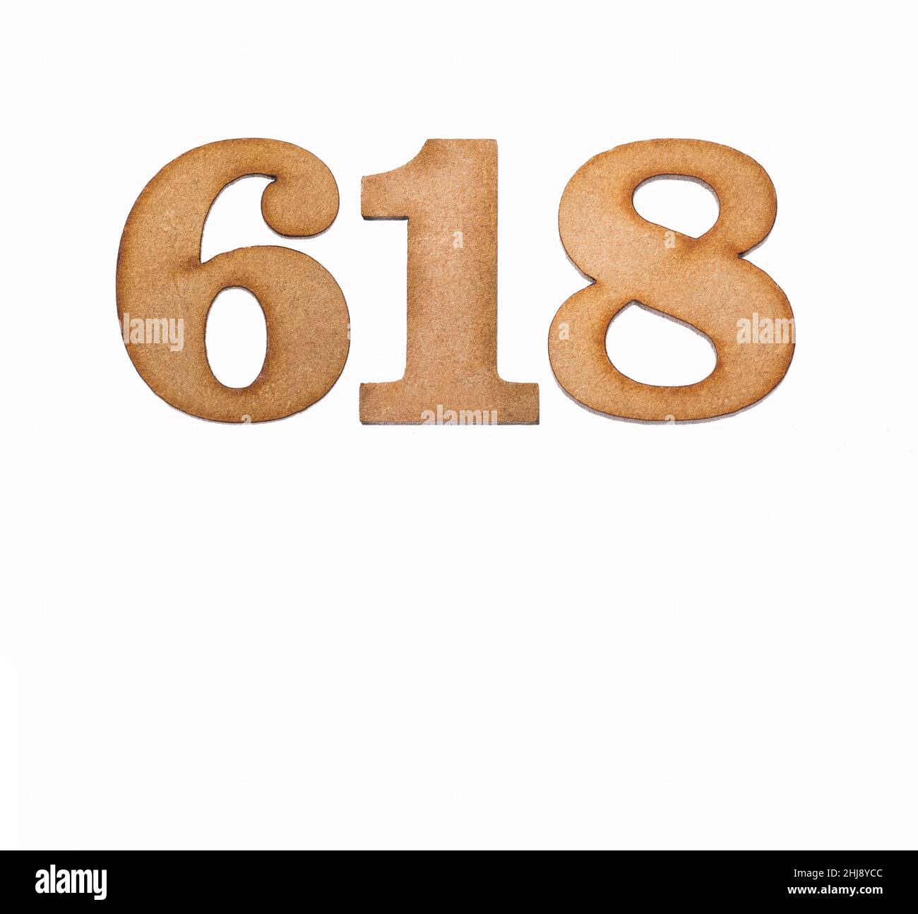 Number 618 - Piece of wood isolated on white background Stock Photo - Alamy