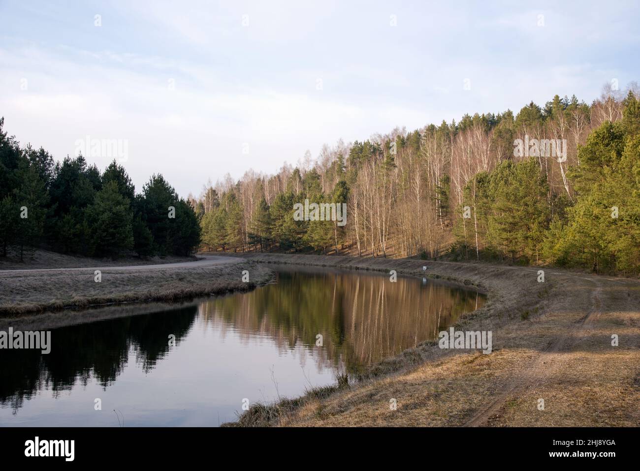 View of a small river in spring. Channel of the Vileyka-Minsk water ...