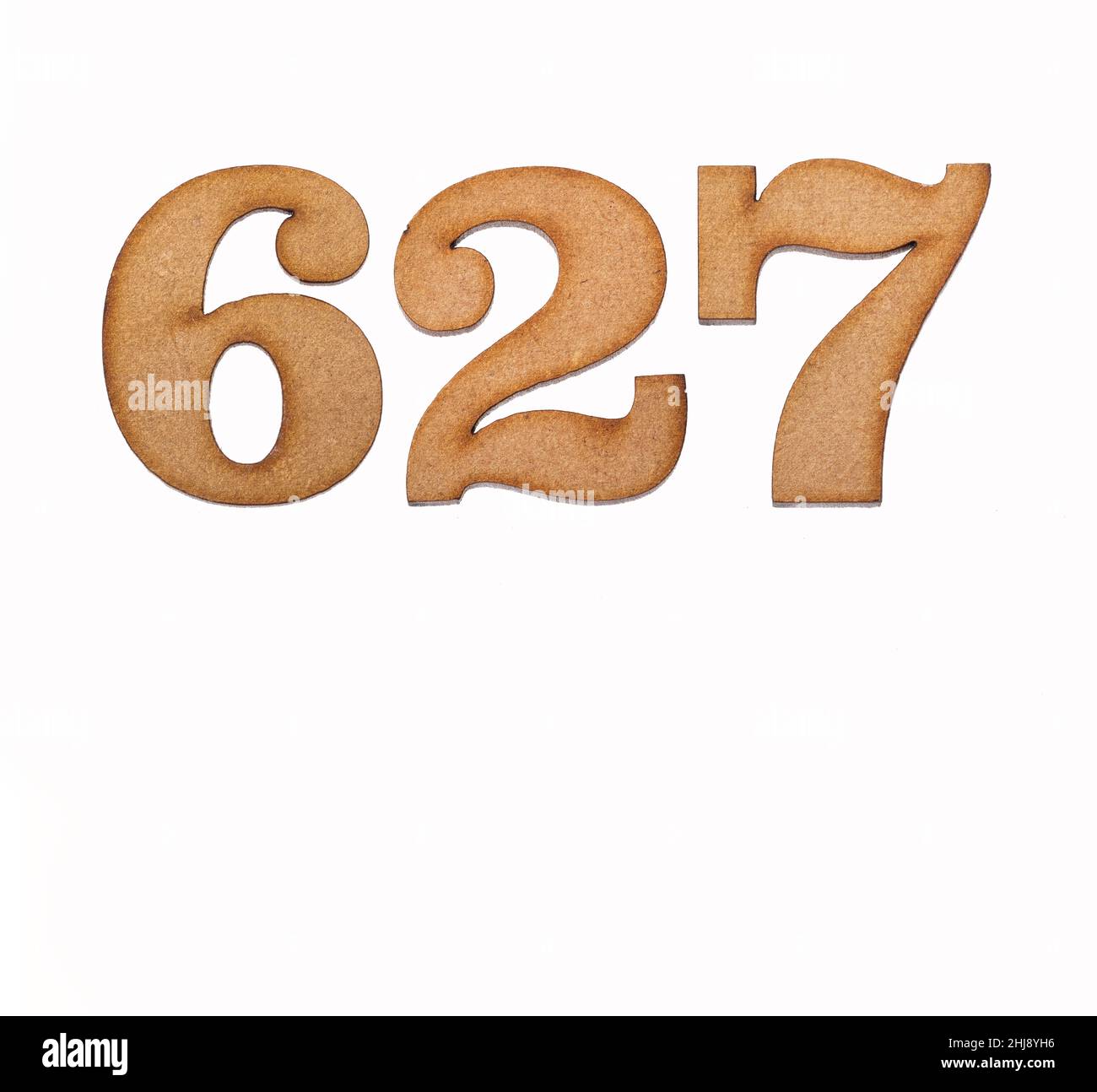 Number 627 in wood, isolated on white background Stock Photo - Alamy