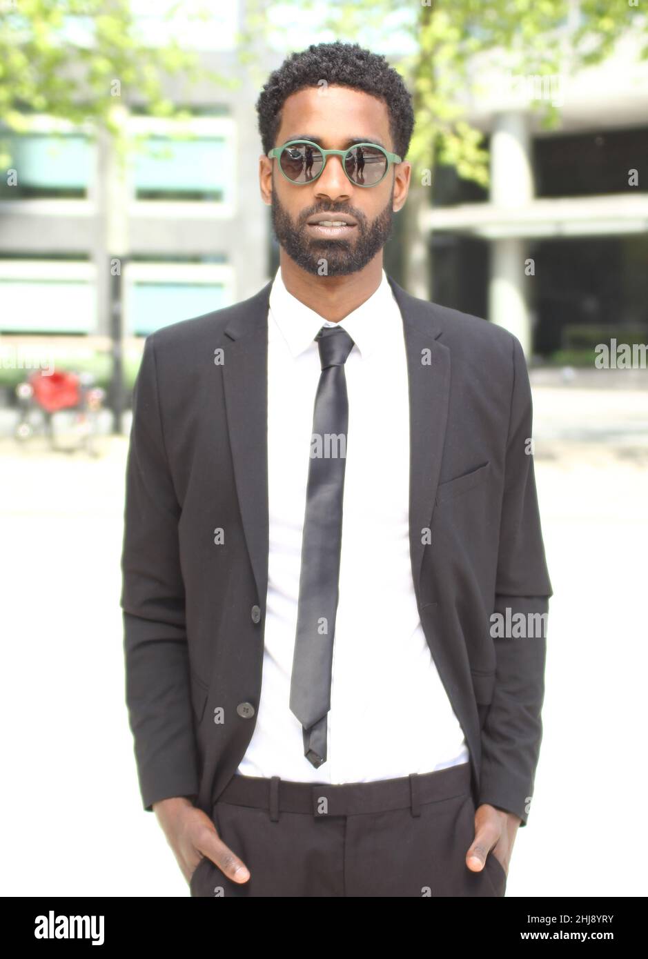 Beautiful businessman outside in the summer Stock Photo - Alamy
