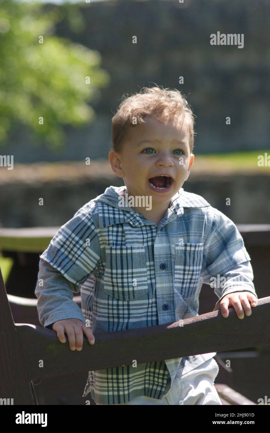 little boy in park shouting Stock Photo - Alamy