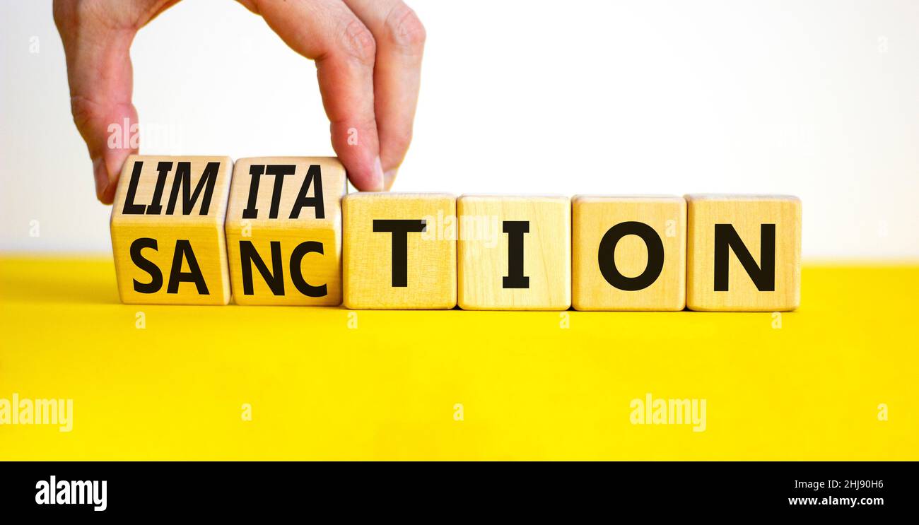 Sanction and limitation symbol. Businessman turns cubes, changes the ...