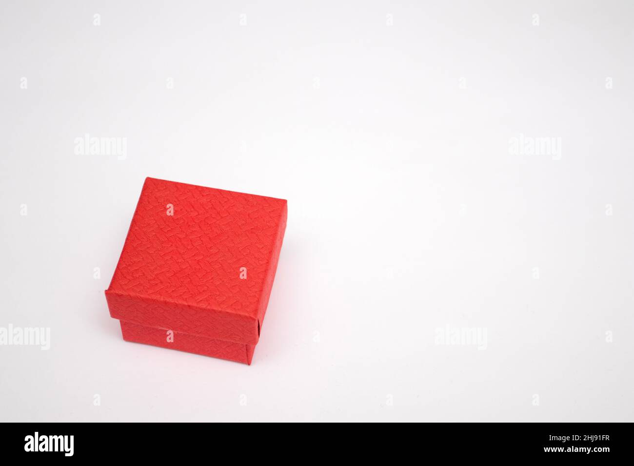 Red blank gift box on white background Stock Photo - Alamy