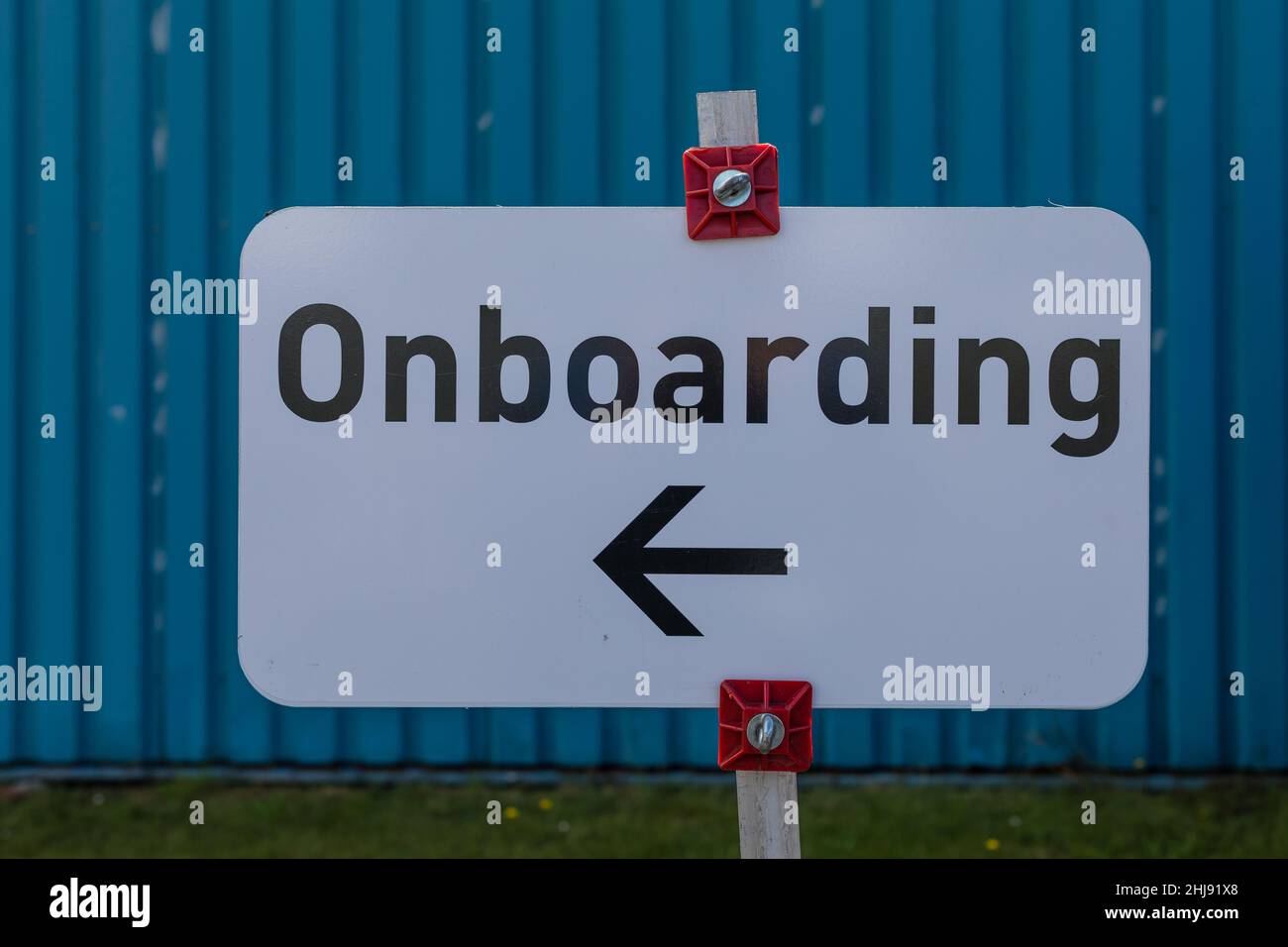 Sign "Onboarding" with arrow to the left side Stock Photo - Alamy