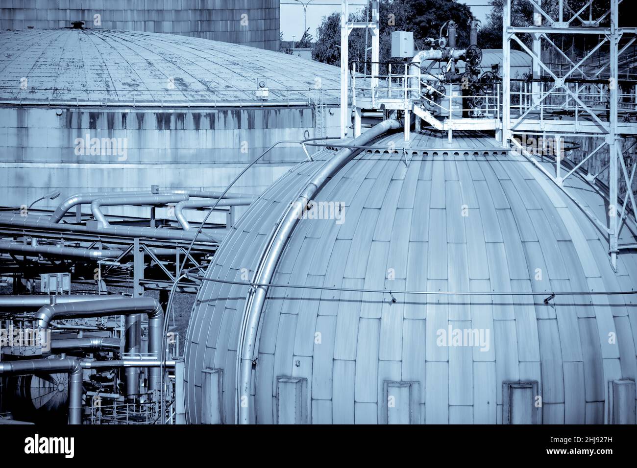 Photoartistic representation of a tank storage area in a chemical plant ...
