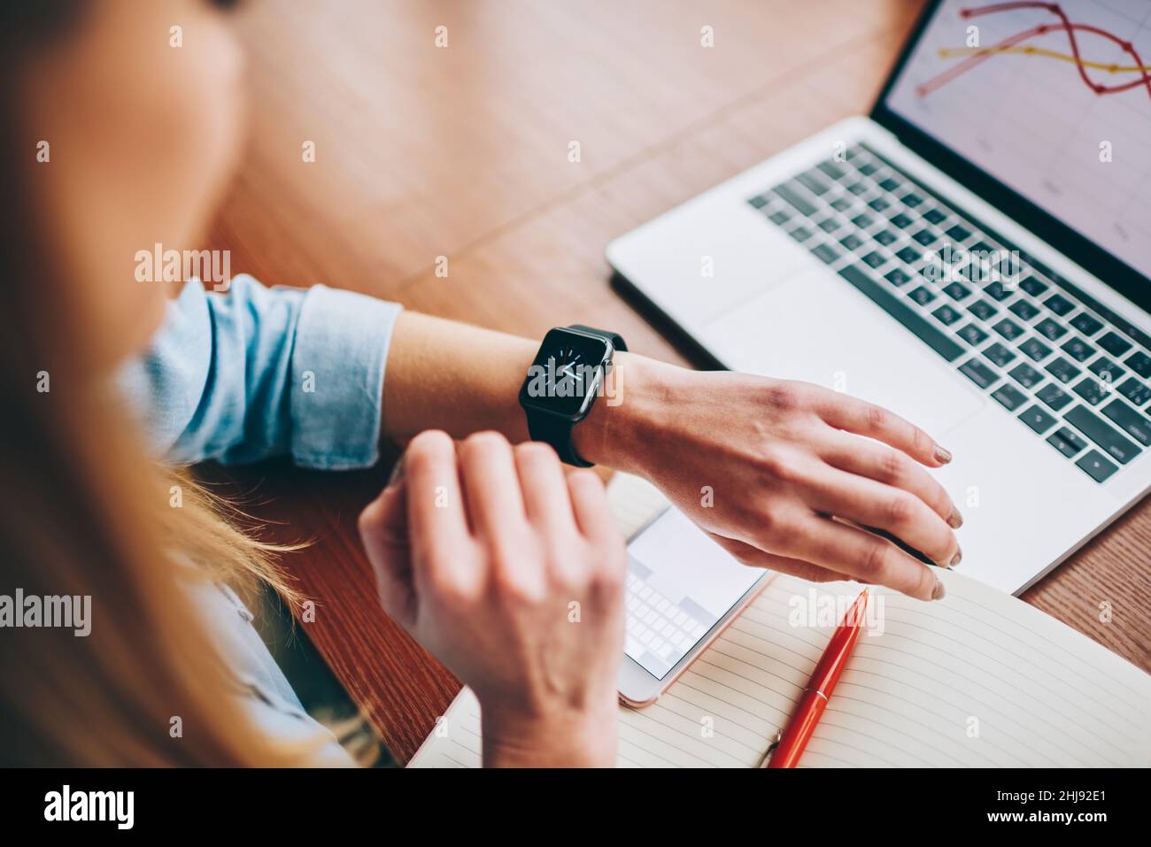 Woman watch time hi-res stock photography and images - Alamy