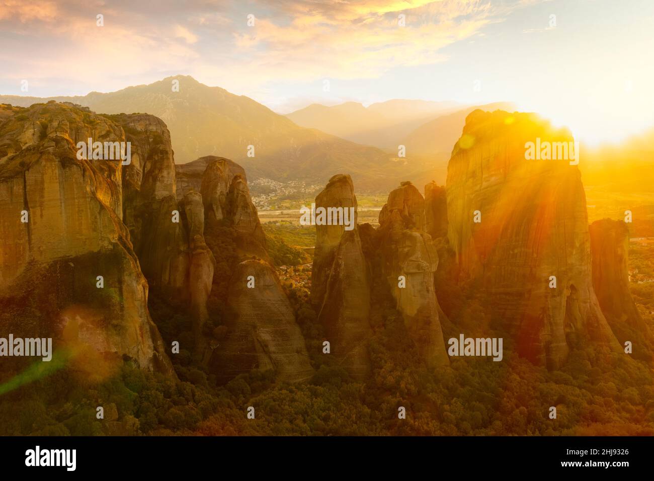 Summer Greece. Bizarre rocks in Meteora. Sunny sunset Stock Photo - Alamy