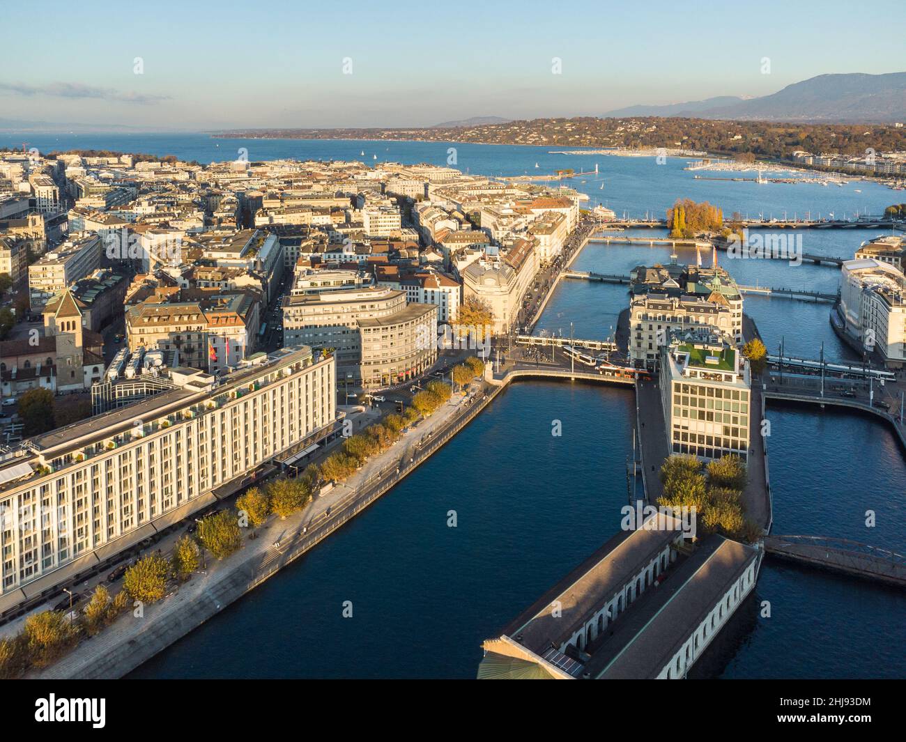 Aerial view of the Rhone river in the heart of Geneva old town and ...