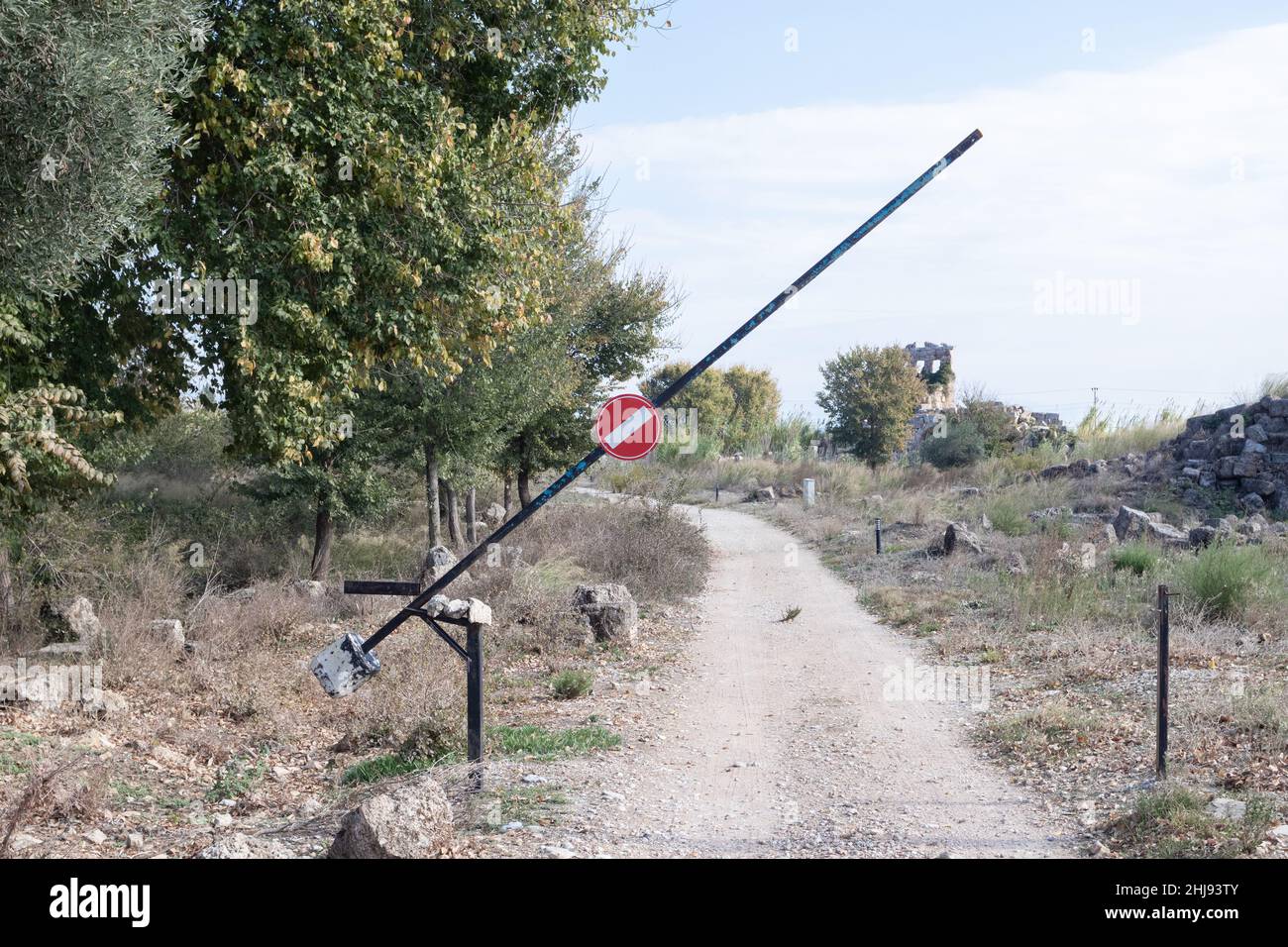 A stop sign and a barrier at the entrance to a private territory Stock ...