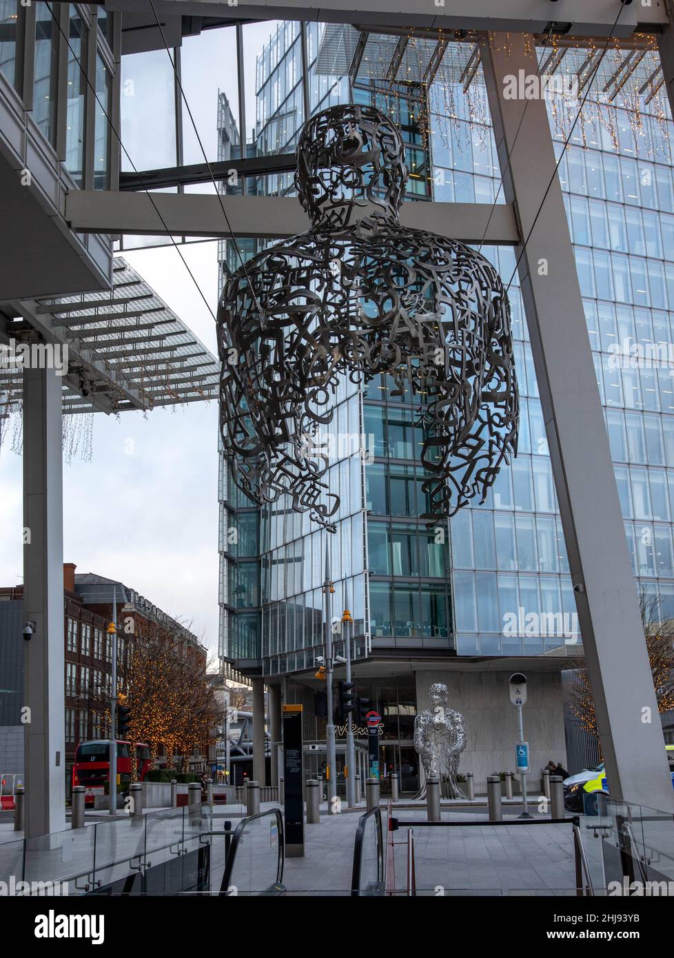 Sculpture of human made from letters from different alphabets Stock ...