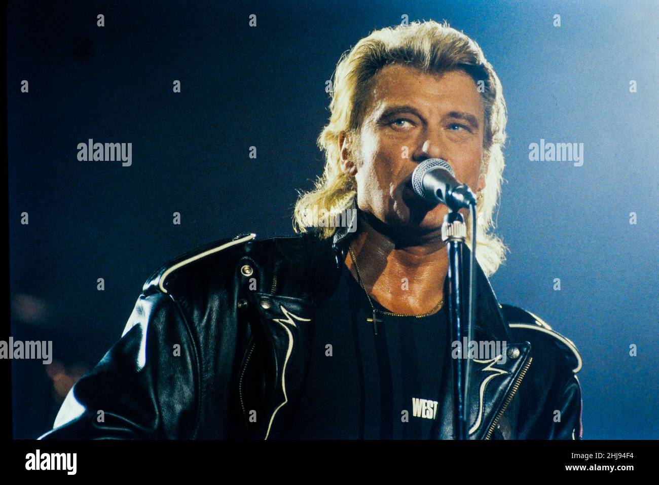 Archives 90ies: Rock singer Johnny Halliday performs in Lyon, France ...