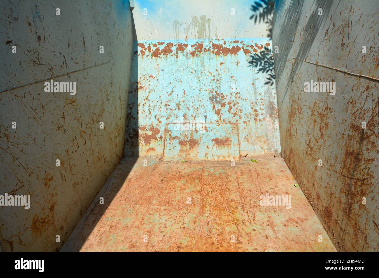 Looking inside a large empty garbage container Stock Photo - Alamy