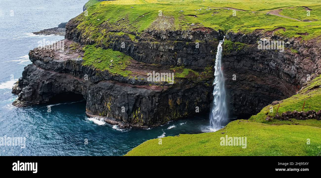 Stunning view of Mulafossur Waterfall. Vagar island, Faroe Islands ...