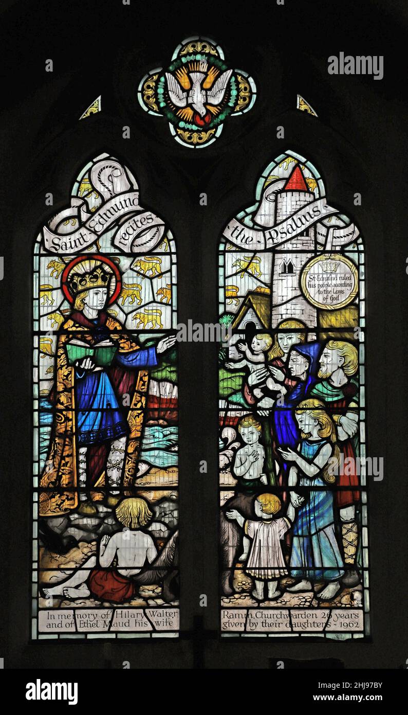 A stained glass window by John Lawson depicting King Edmund amongst his ...