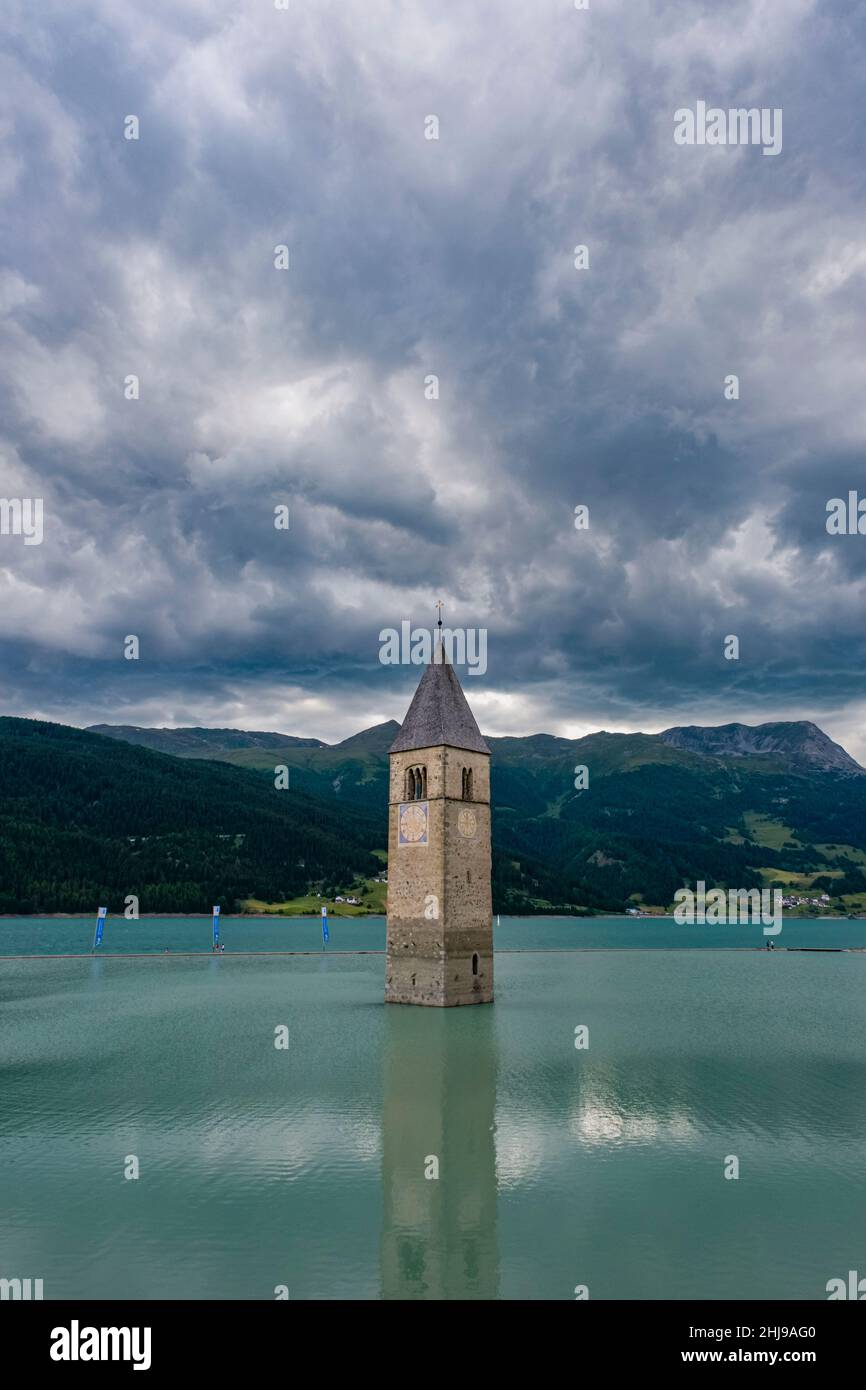 The bell tower of the church St. Katharina sticks out of the water of ...