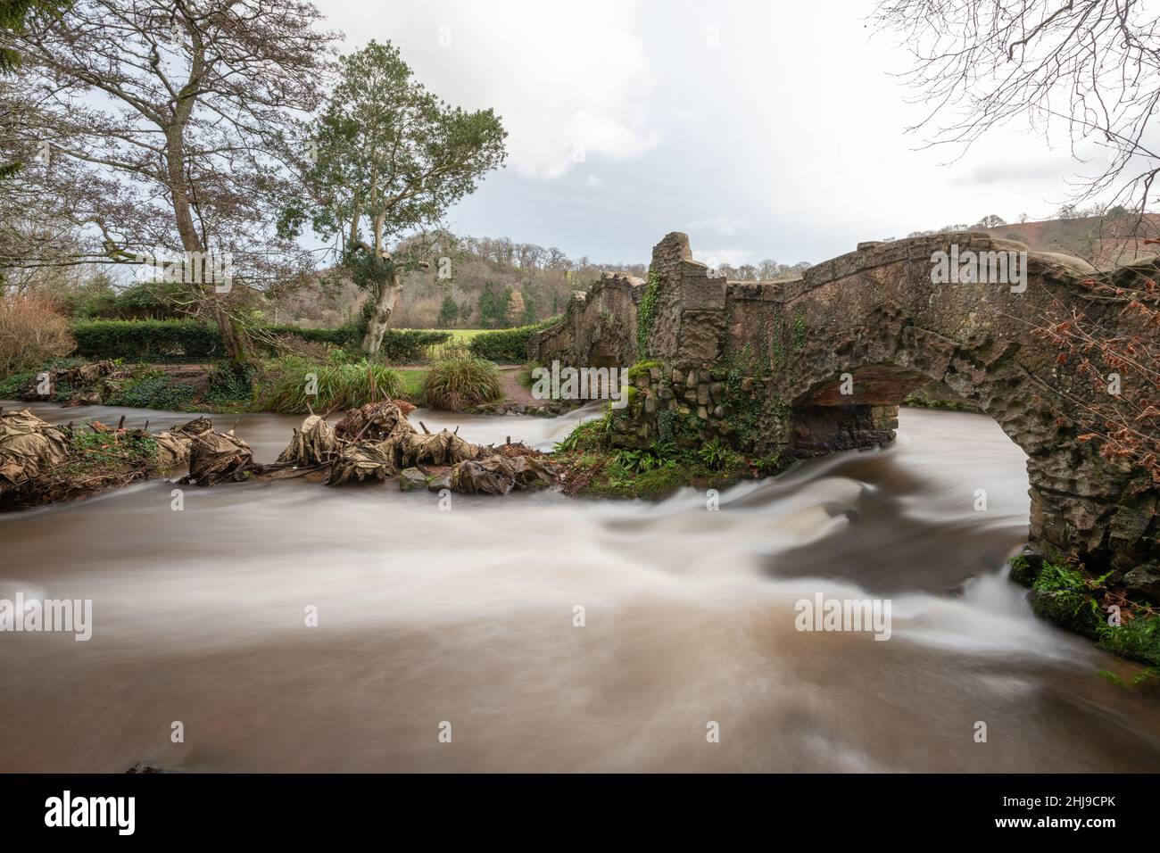Long exposure of the river Avill flowing under Lovers bridge in the ...