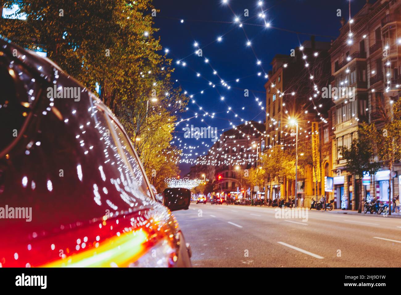 Car riding on night city road Stock Photo - Alamy
