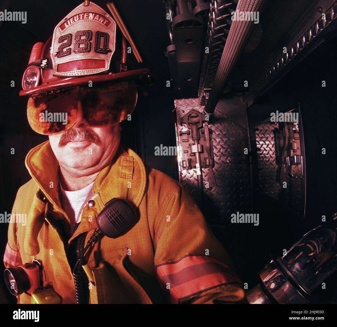 Firefighter in turnout gear Stock Photo - Alamy