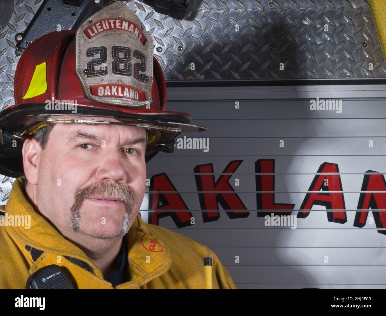 Firefighter in turnout gear Stock Photo - Alamy
