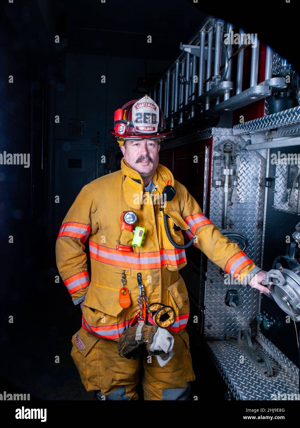 Firefighter in turnout gear Stock Photo - Alamy