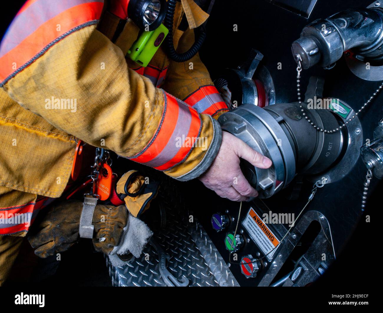 Firefighter in turnout gear Stock Photo - Alamy