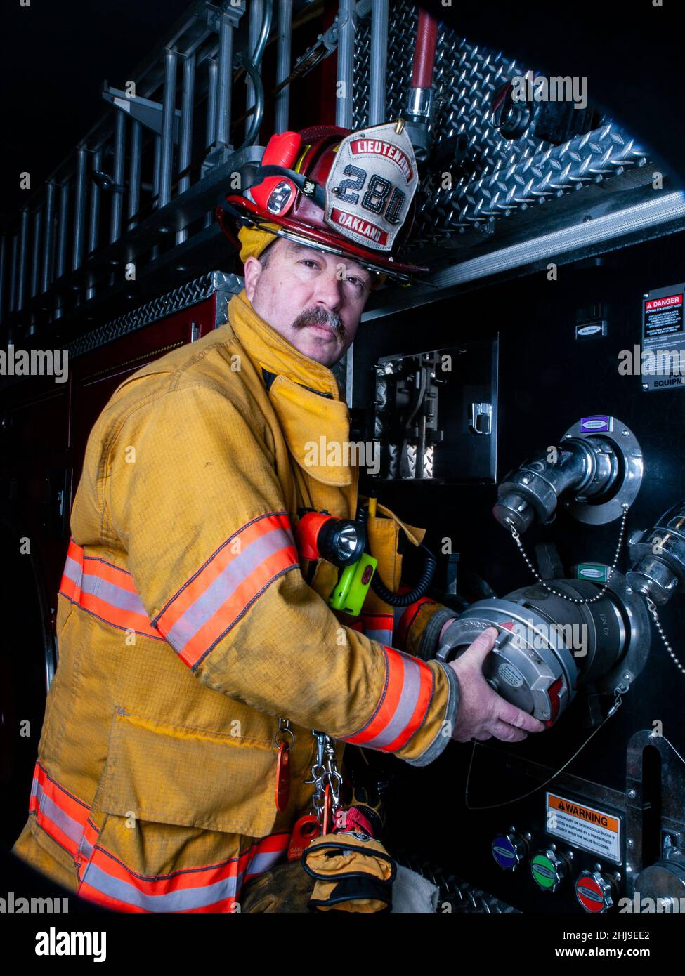 Firefighter in turnout gear Stock Photo - Alamy