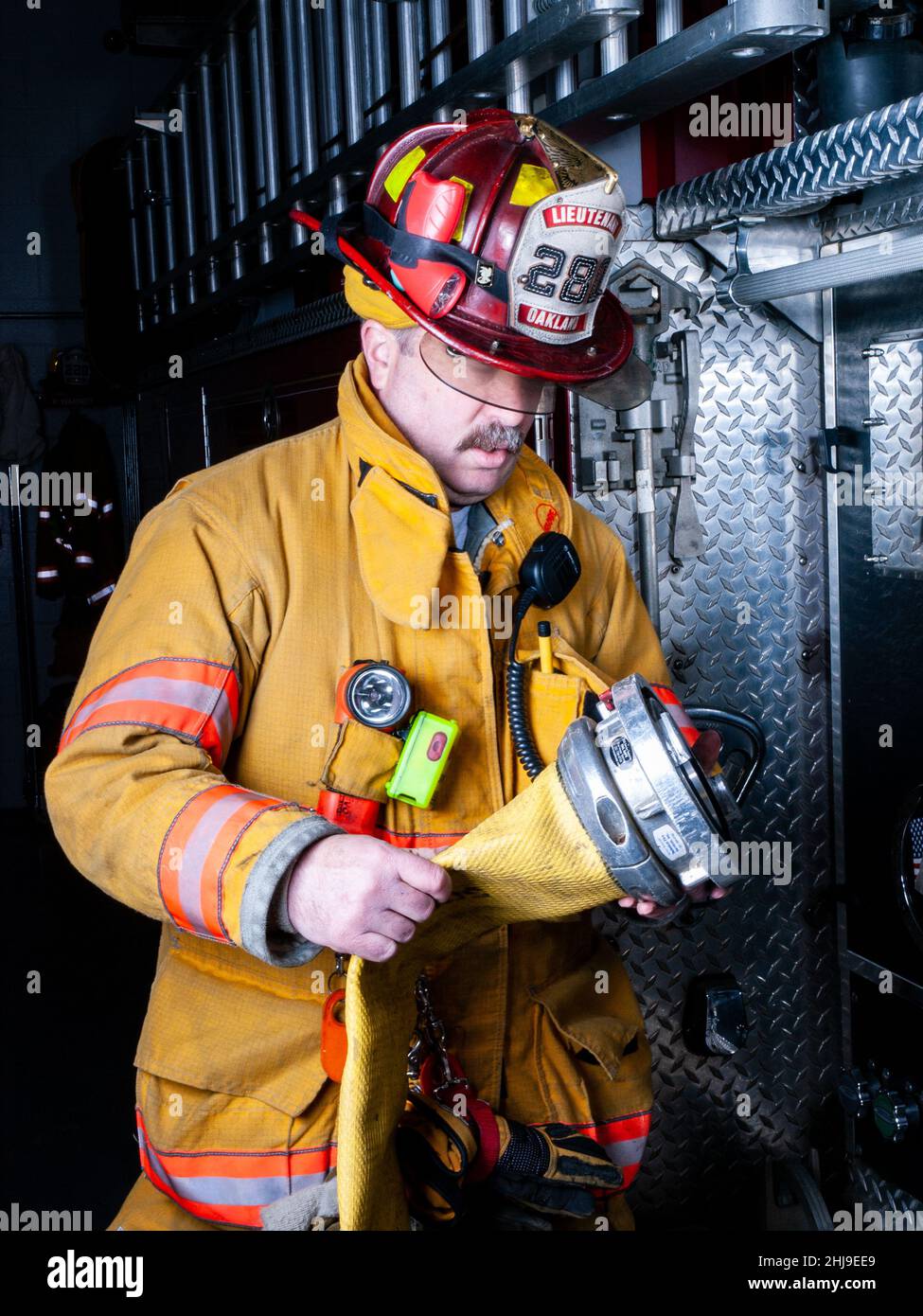 Firefighter in turnout gear Stock Photo - Alamy