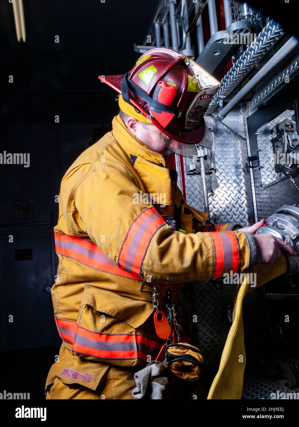 Firefighter in turnout gear Stock Photo - Alamy