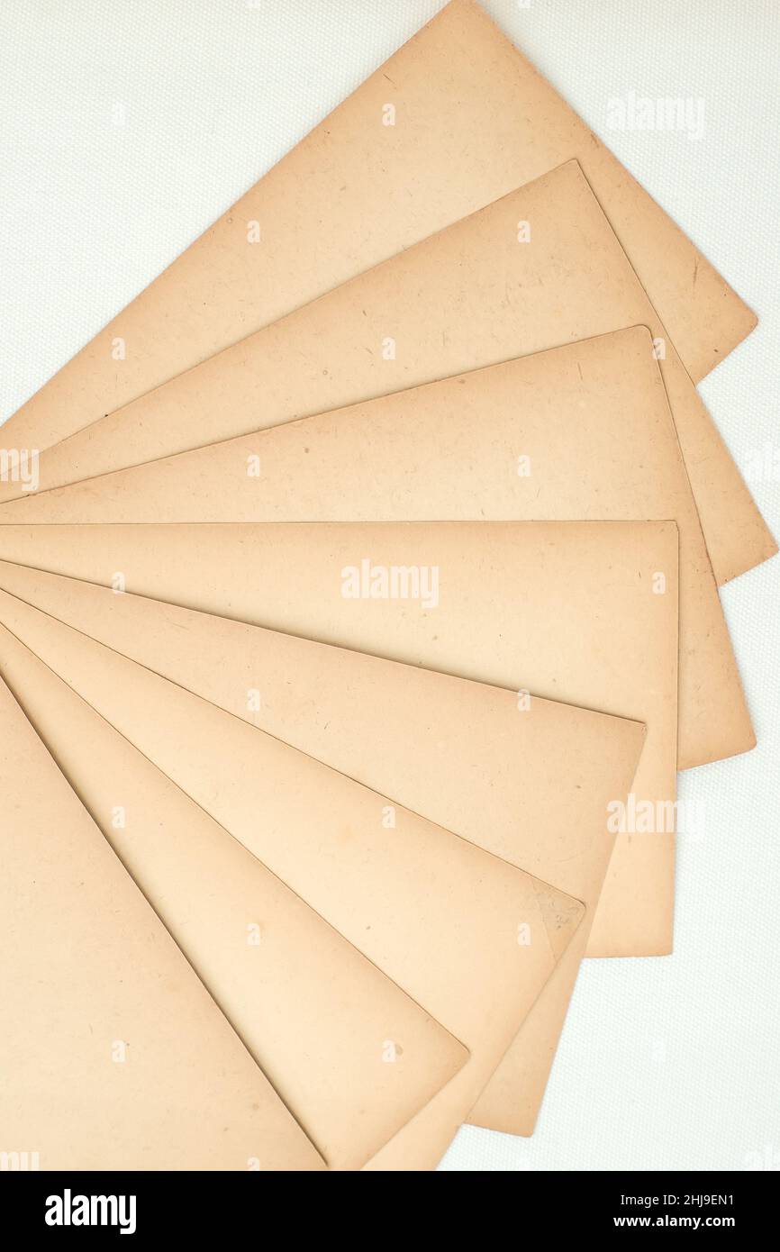 textured vintage book pages on white canvas, arranged like a fan Stock ...