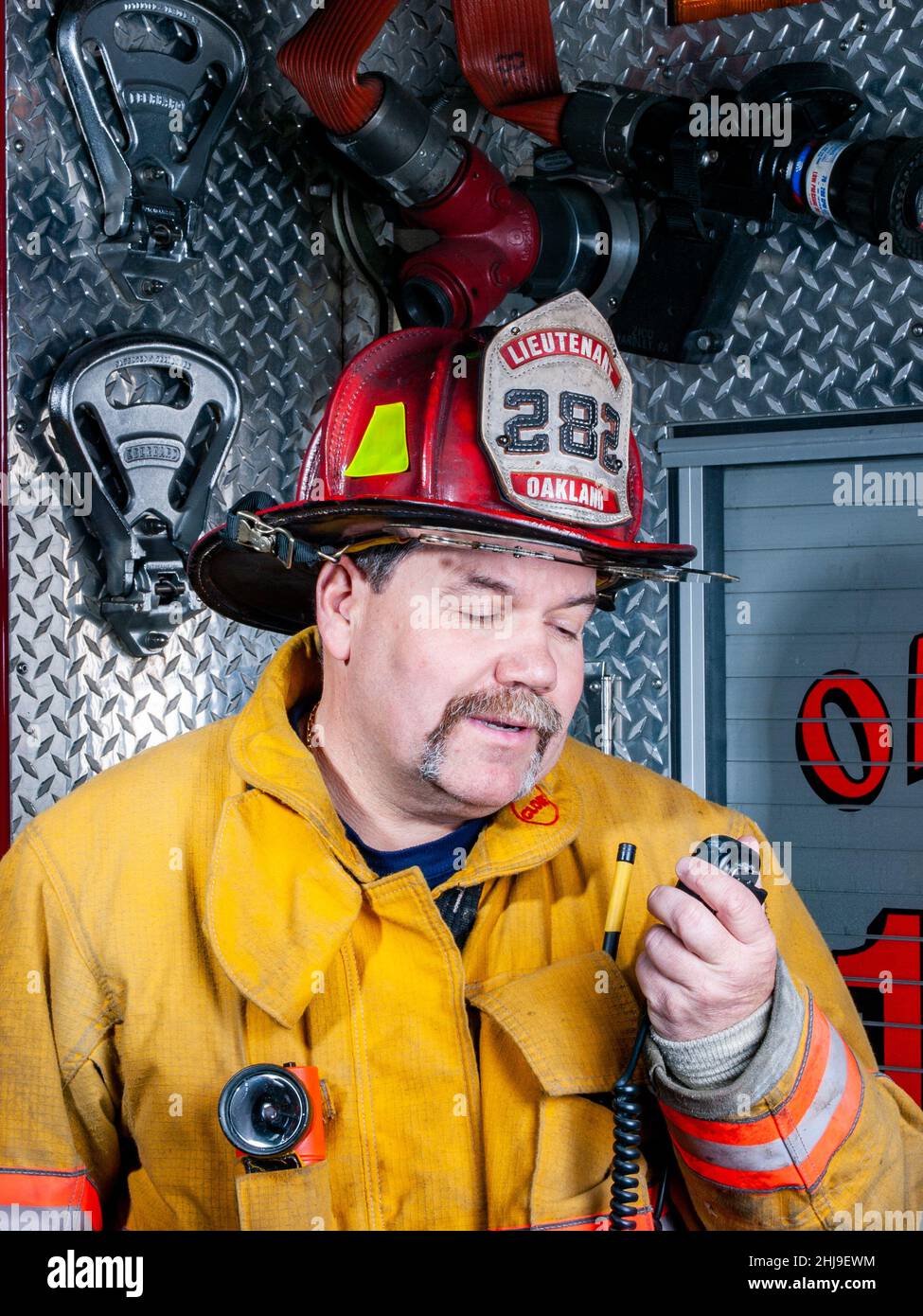 Firefighter in turnout gear Stock Photo - Alamy