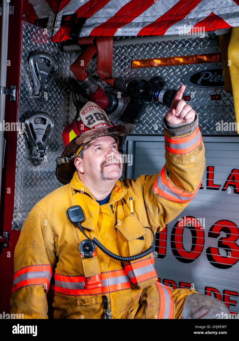 Firefighter in turnout gear Stock Photo - Alamy